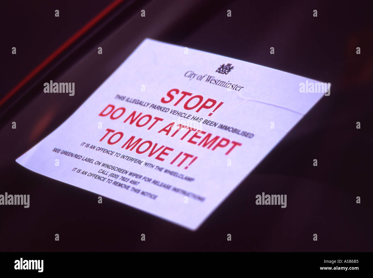 Car Clamping notice Stock Photo - Alamy