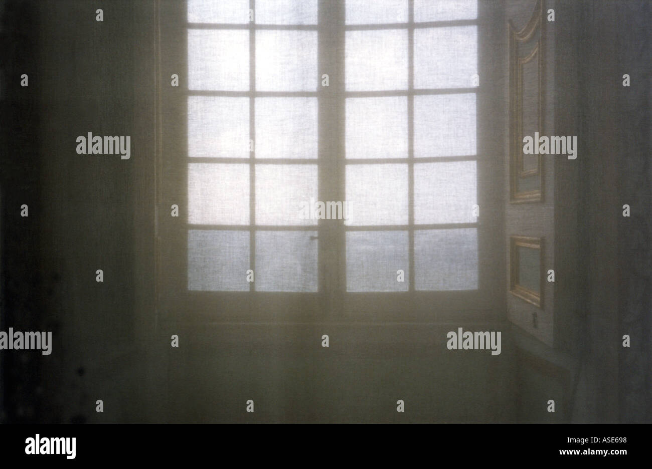 Window behind curtains Stock Photo - Alamy