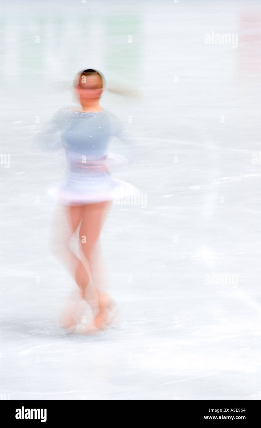 female figure skater spinning Stock Photo - Alamy
