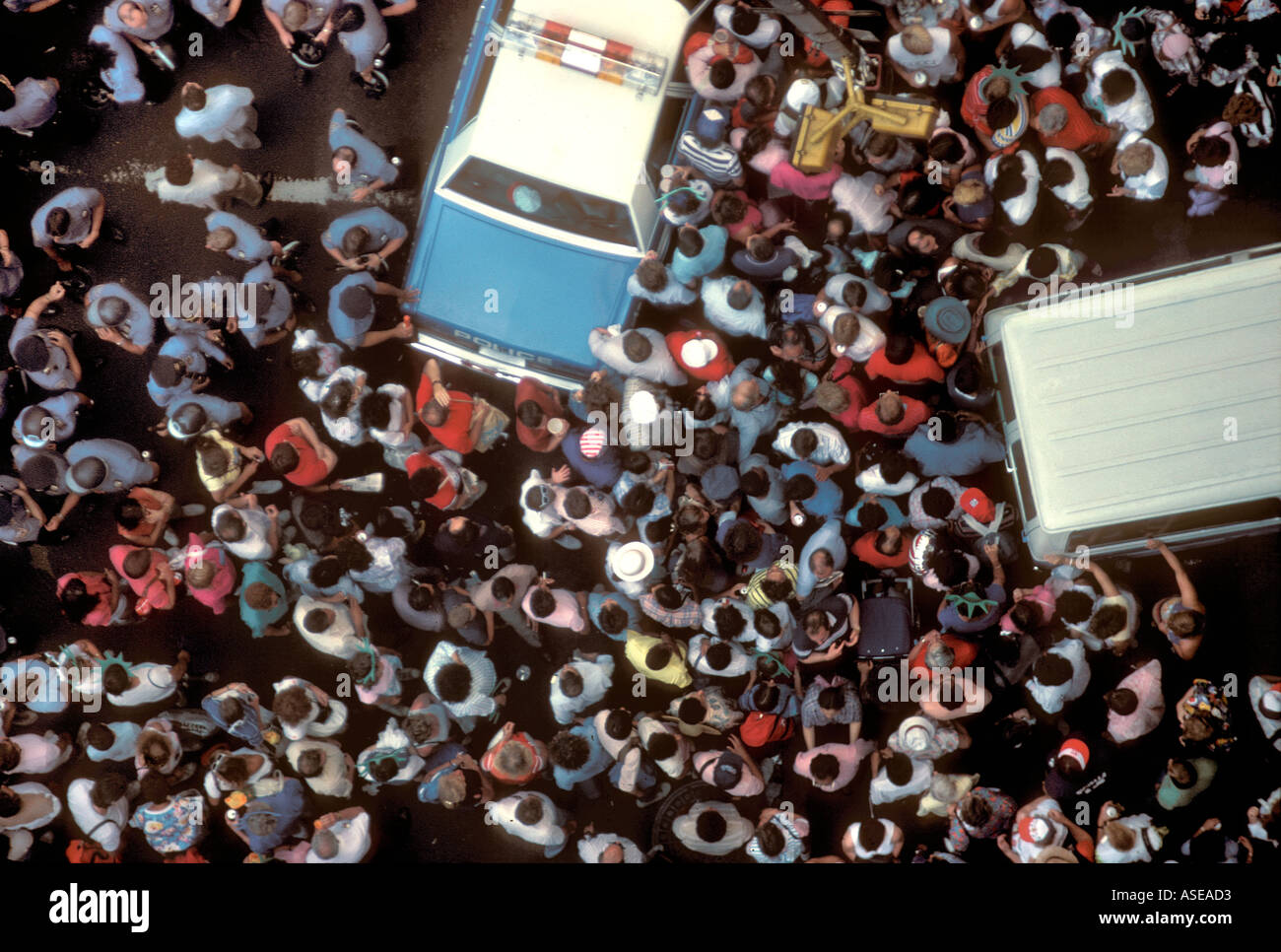 police arrive in squad cars and try to control a demonstrating crowd in ...