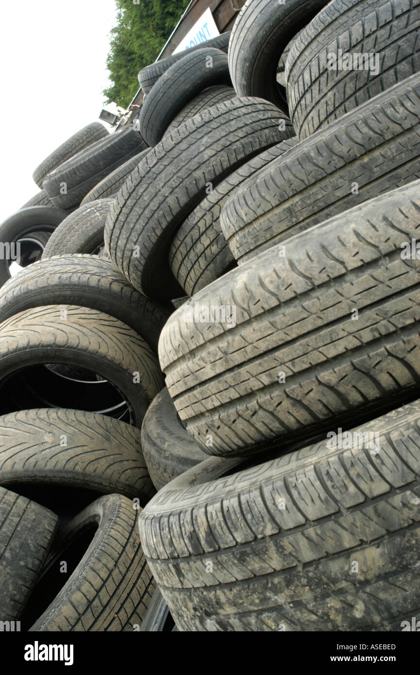 Old and used tyres Stock Photo - Alamy