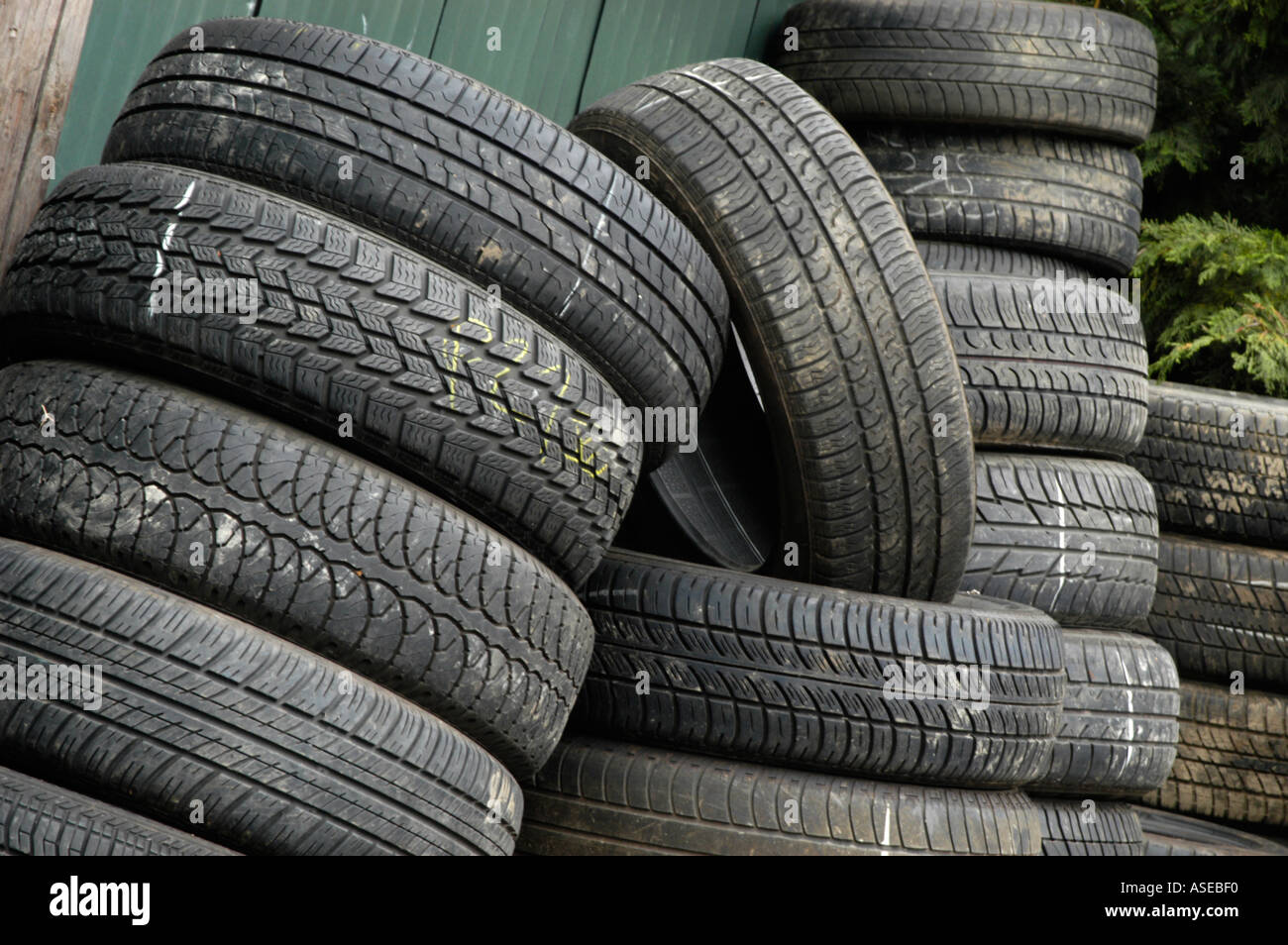 Old and used tyres Stock Photo - Alamy