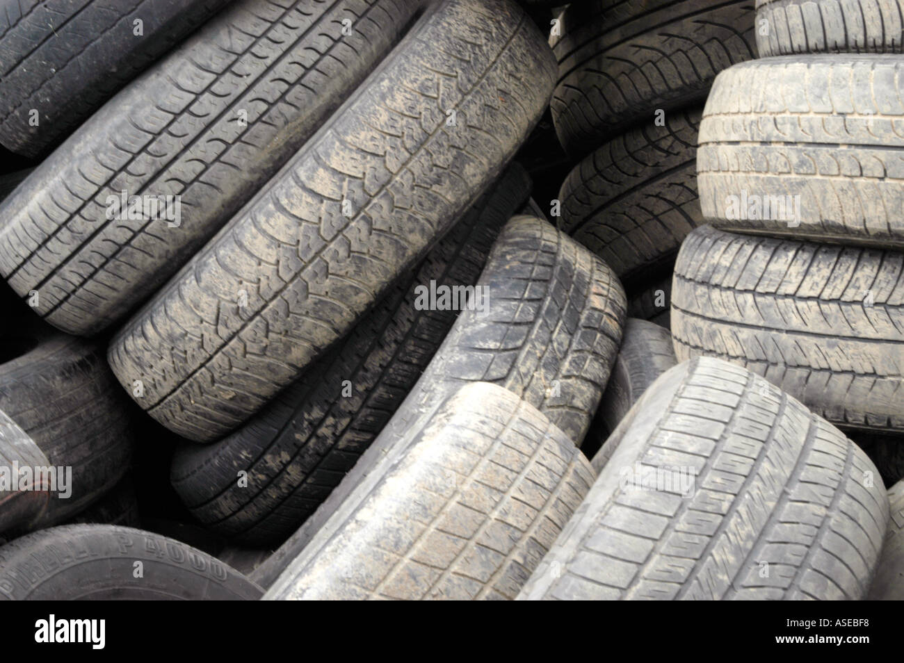 Old and used tyres Stock Photo - Alamy