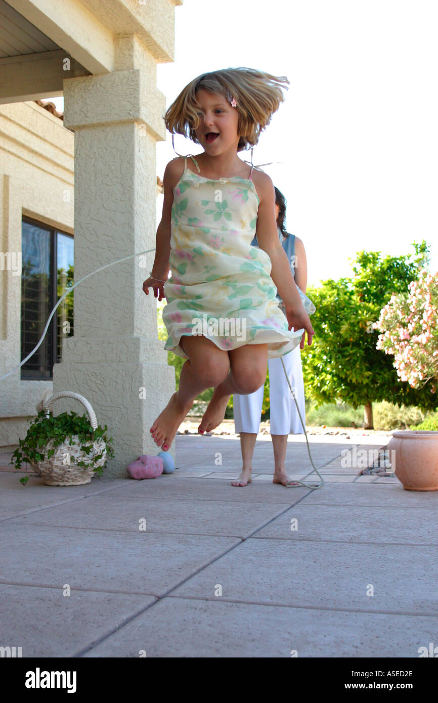 Girl Jumping Rope Stock Photo - Alamy