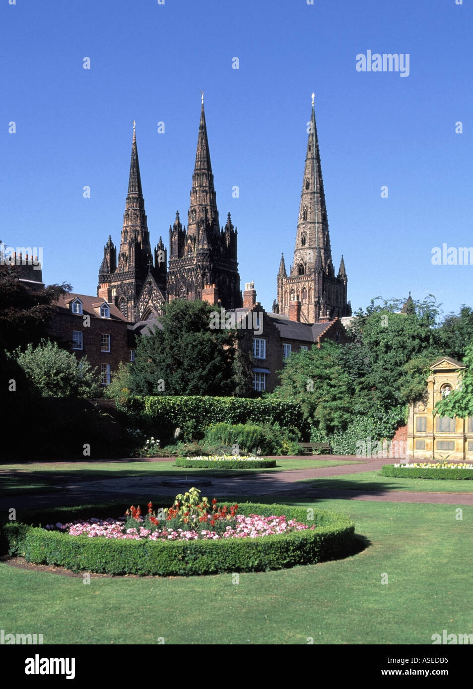 Medieval english cathedral with three spires hi-res stock photography ...