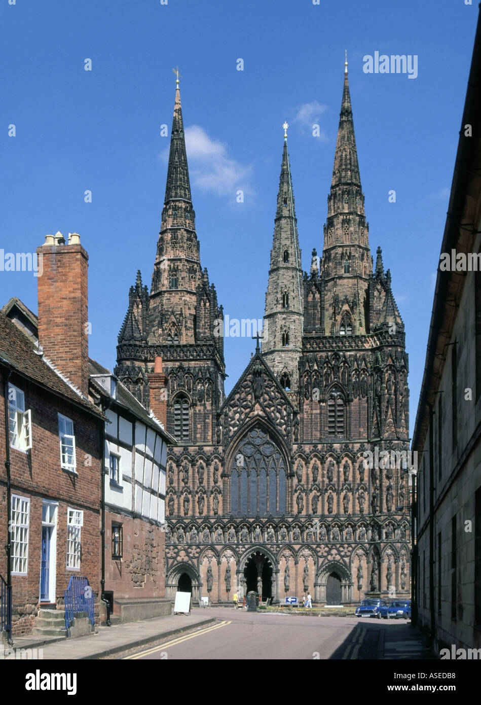 Medieval english cathedral with three spires hi-res stock photography ...