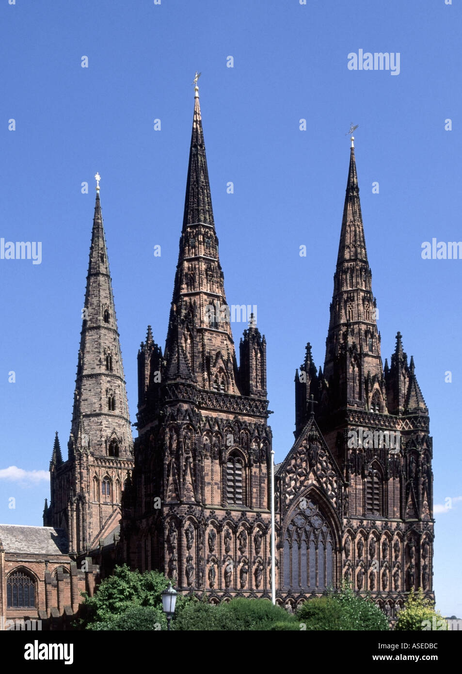 Medieval english cathedral with three spires hi-res stock photography ...