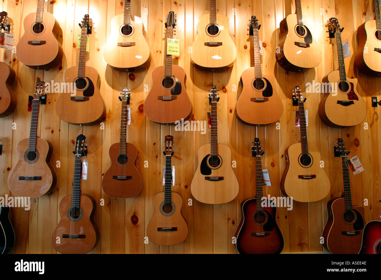 Music store guitar guitars hi-res stock photography and images - Alamy