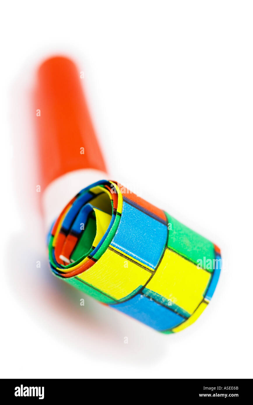 Party kazzoo blower buzzer whistle thing Stock Photo - Alamy