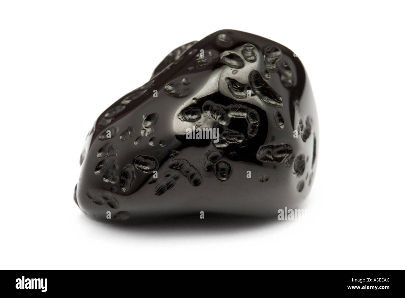 Tektite tumble smoothed mineral sample possibly formed from meteor ...