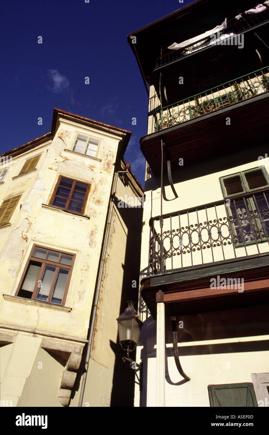 Beautiful old building painted yellow against clean and crisp blue sky ...
