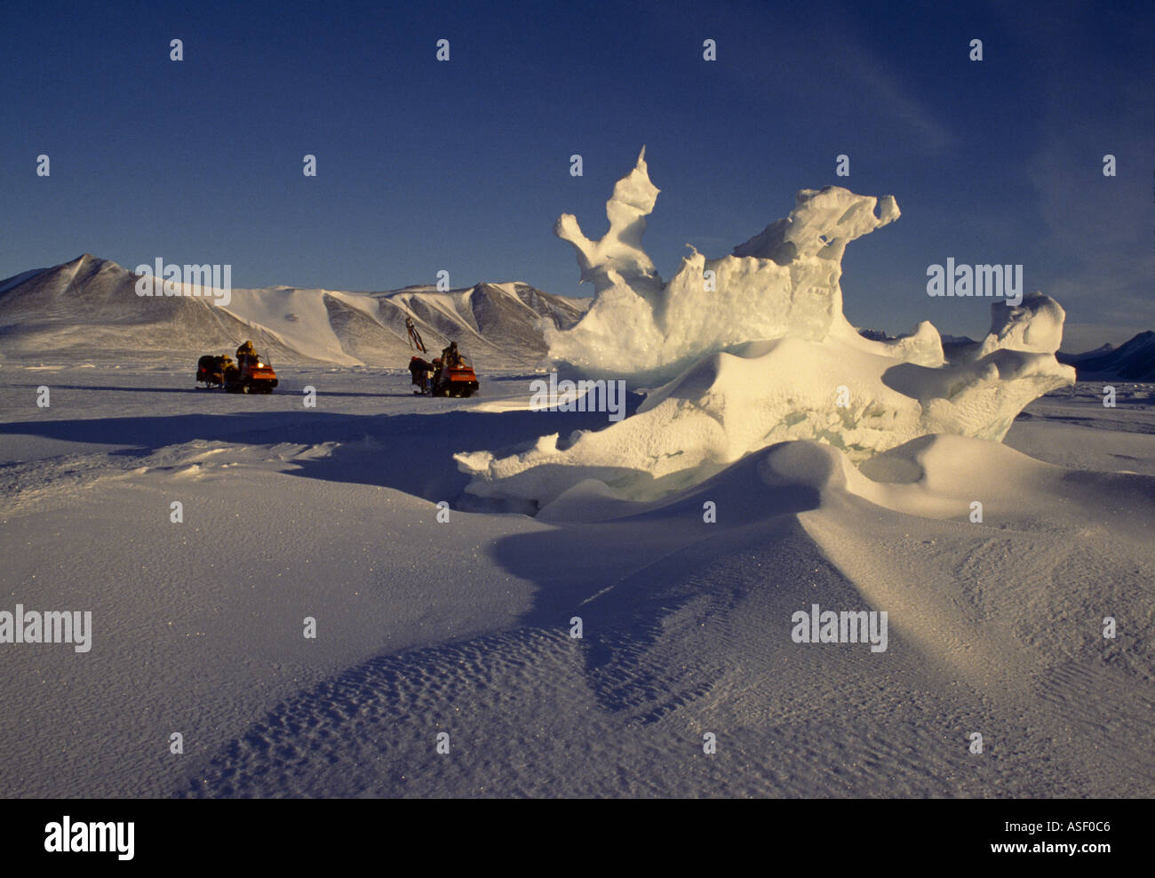 Broken sea ice sculpted by wind and sun Fast sea ice near coastline Two ...