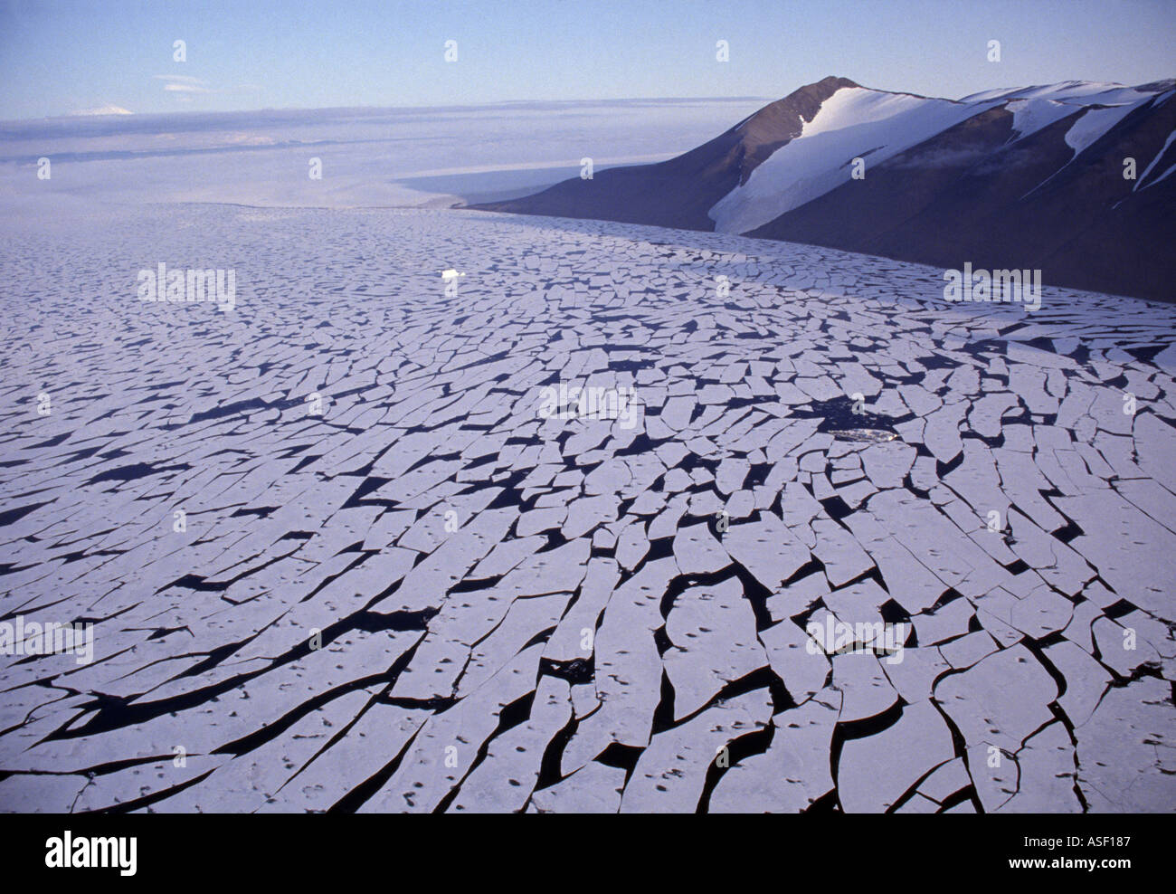 Fast sea ice broken up by ocean swells in late summer Herbertson ...