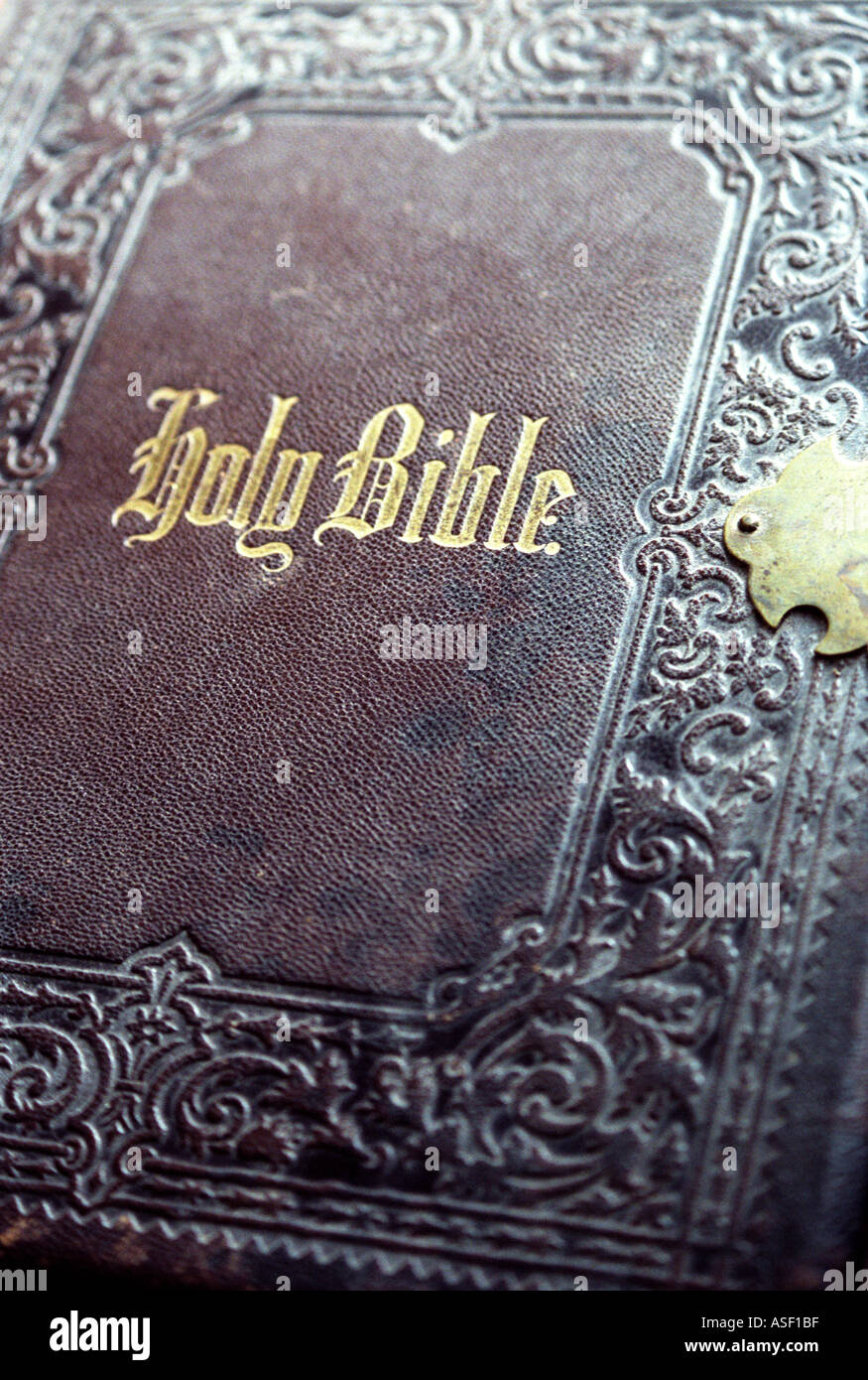 A close up of the leather bound cover of an old Holy Bible Stock Photo ...