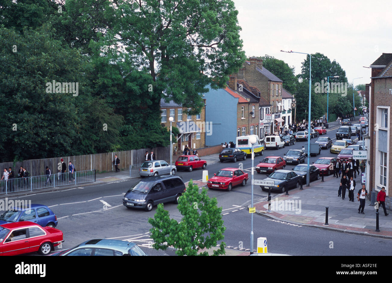 Secondary and junior school pupils coming out of school, Heston ...