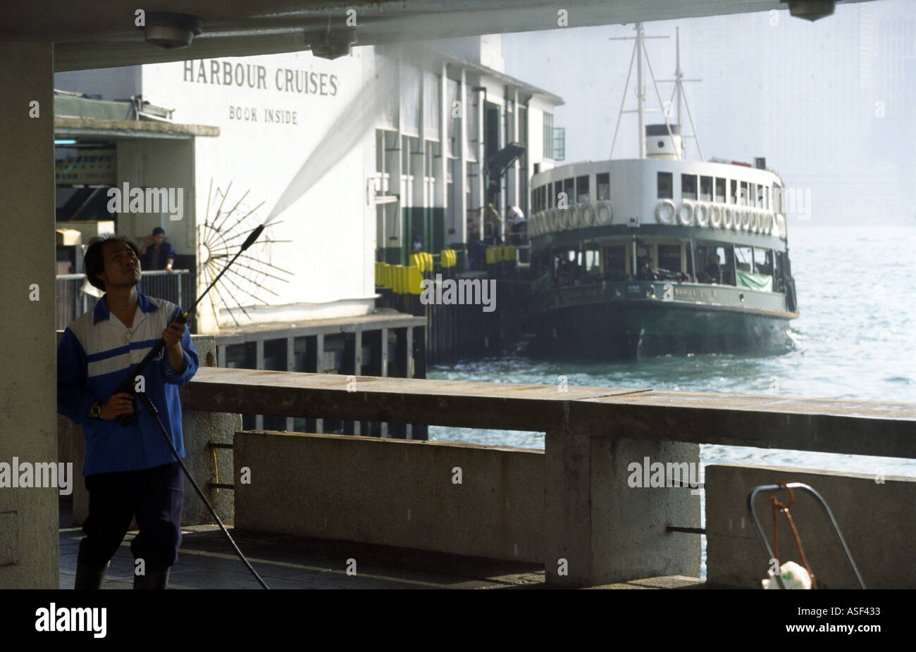 the harbour being cleaned with a ship of the star ferry company kowloon ...