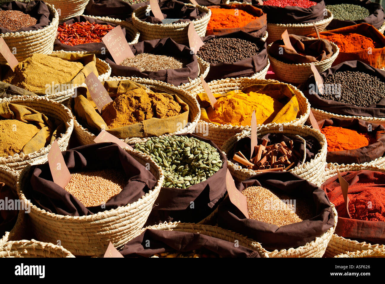 colourful spices on market stall Stock Photo - Alamy