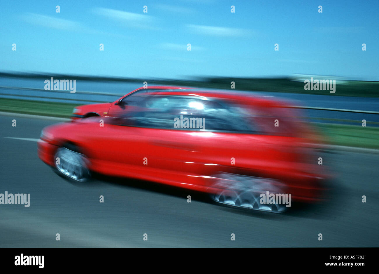 Red Cars racing Stock Photo - Alamy