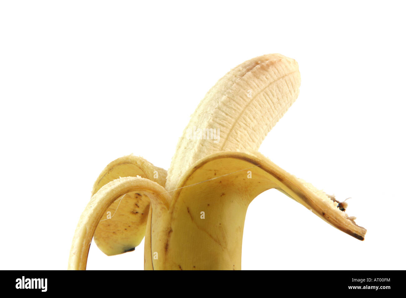 open peel of banana isolated on white background Stock Photo - Alamy
