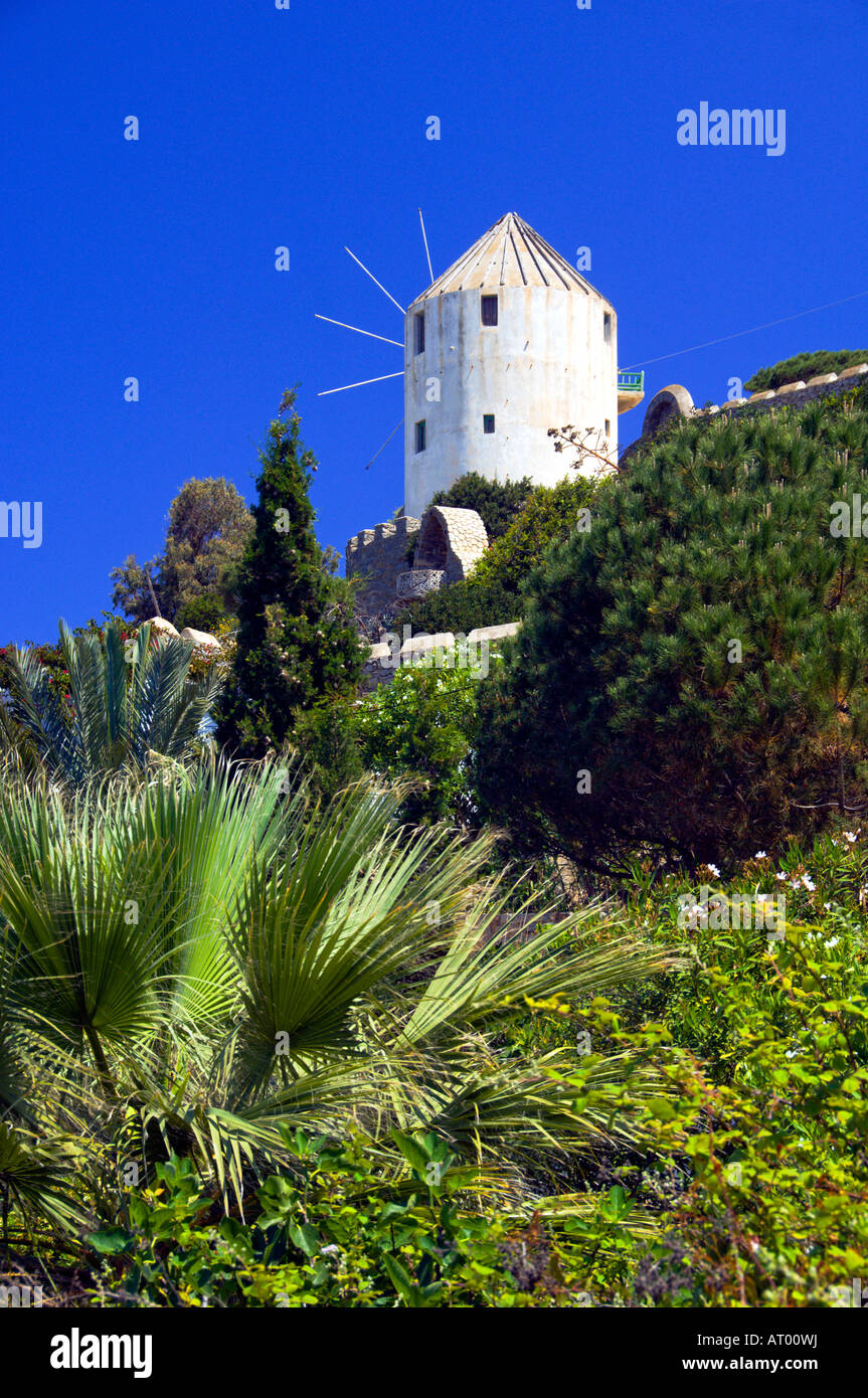 The Bonis windmill at the Folklore Museum overlooking the port of Hora ...