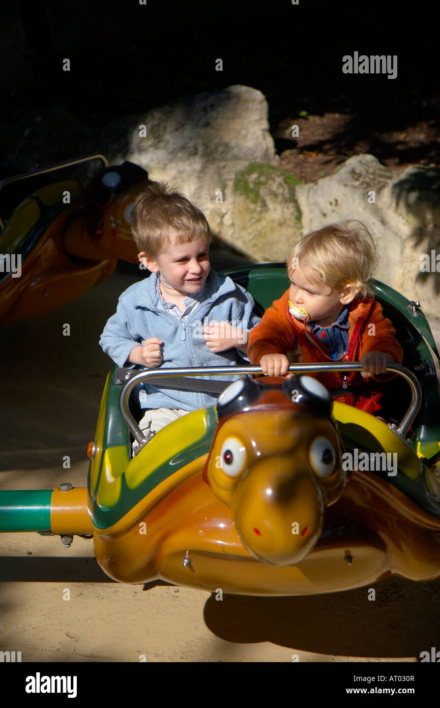 children in carousel Stock Photo - Alamy