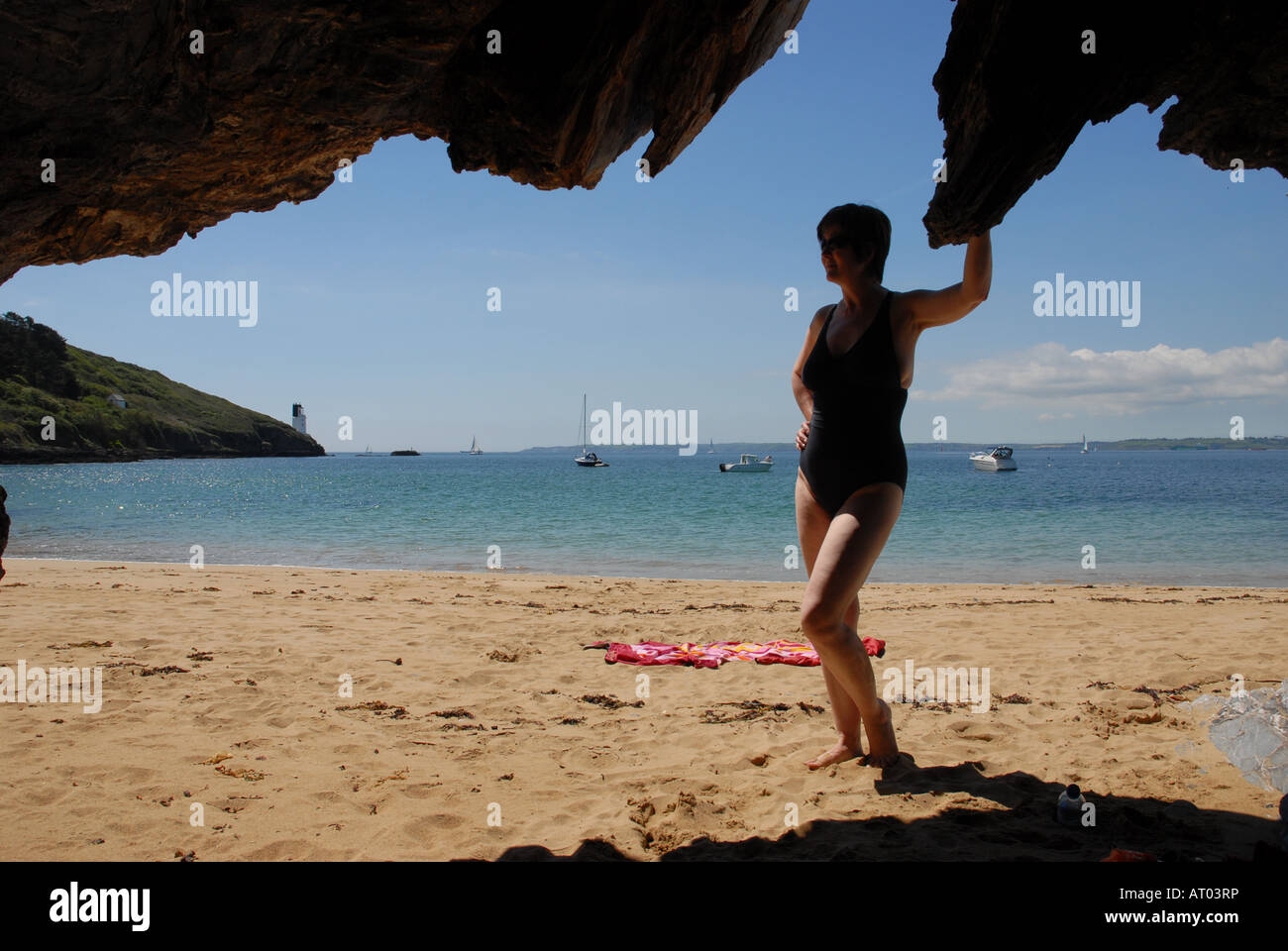 Sun bathing on Molunan beach along The South West Coast Path from St ...