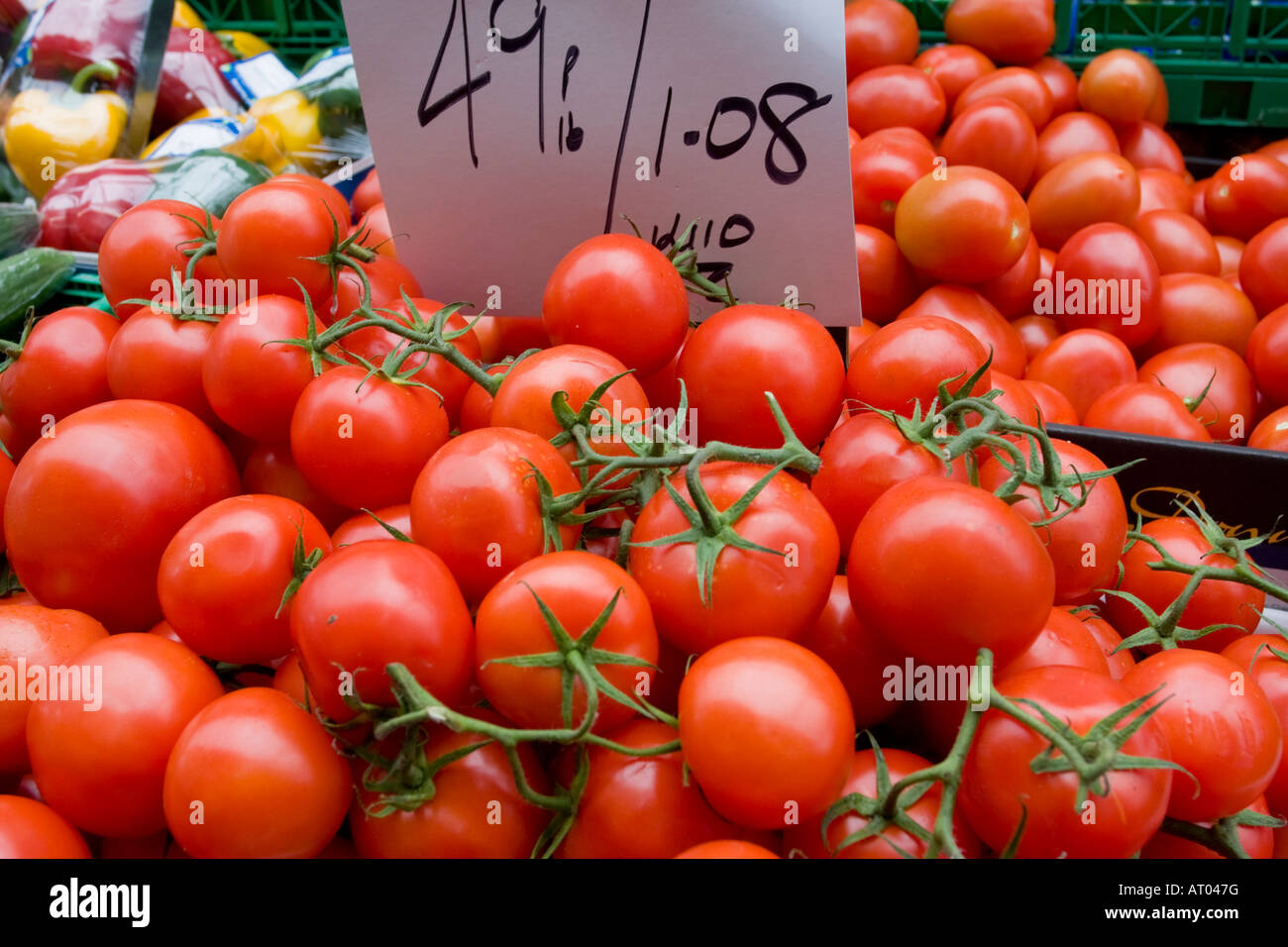 vine tomatoes being sold on a fruit and veg stall on Bury market Stock ...