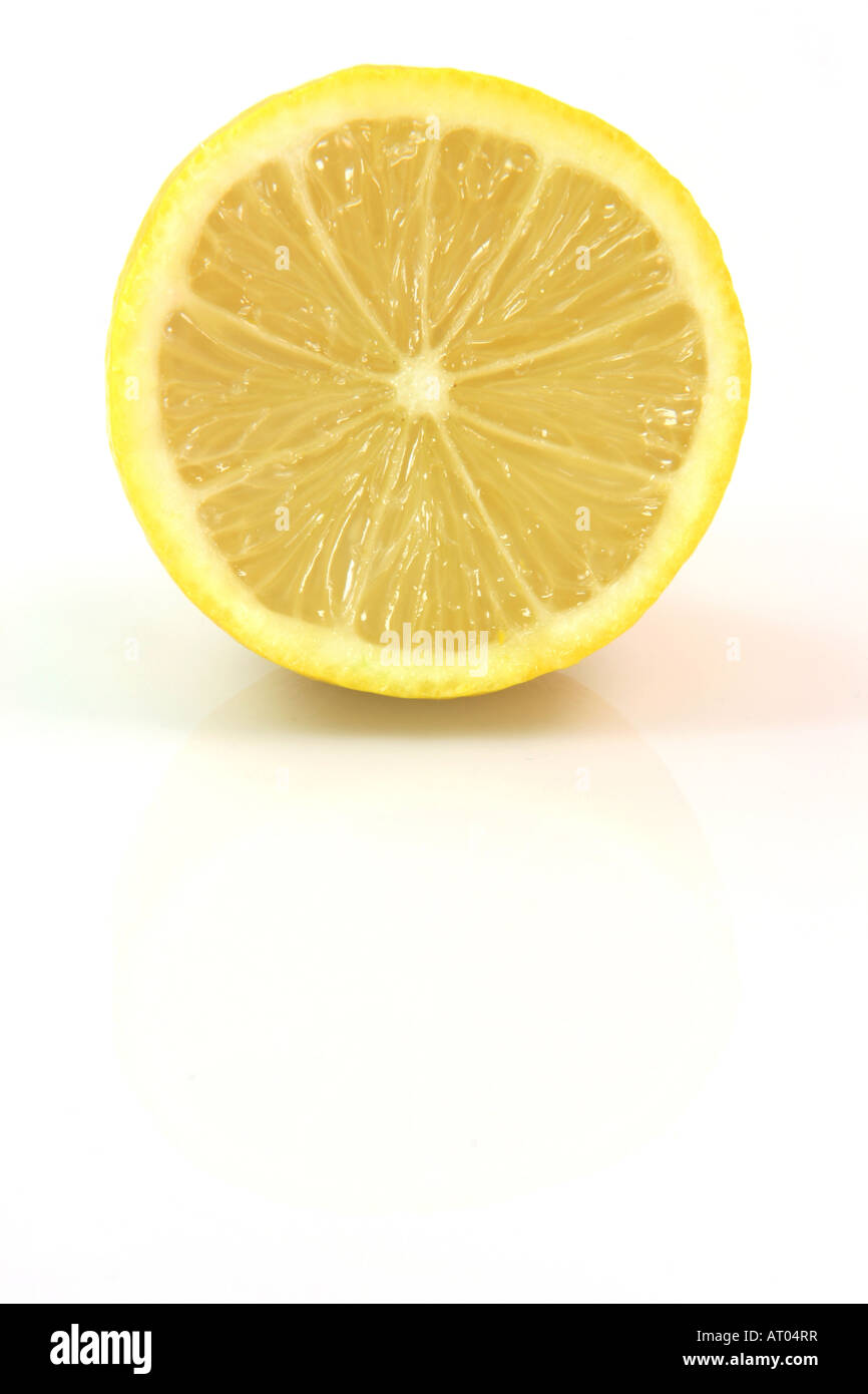 half lemon isolated on white background fruits and vegetables Stock ...