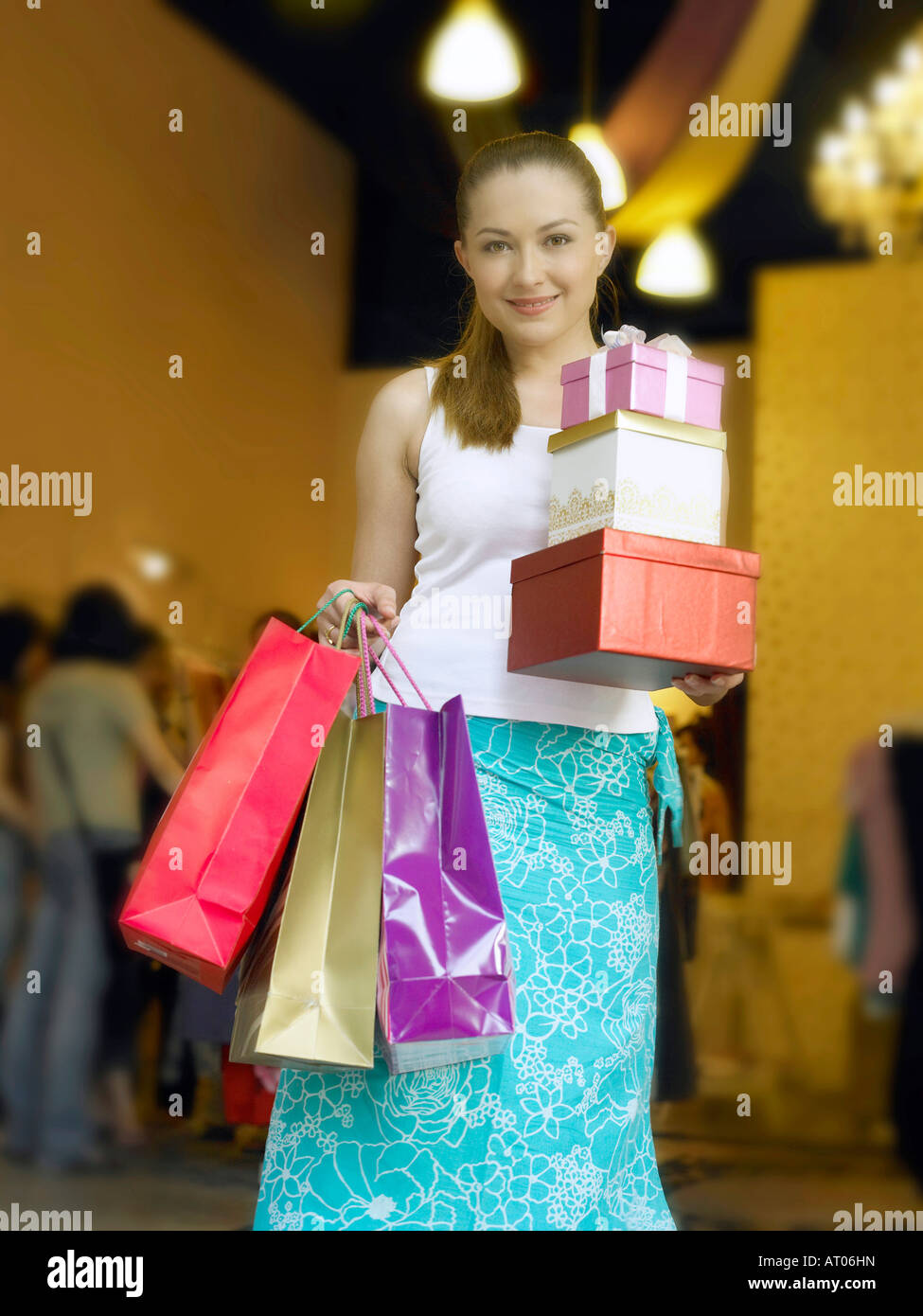 Woman shopper carrying box hi-res stock photography and images - Alamy