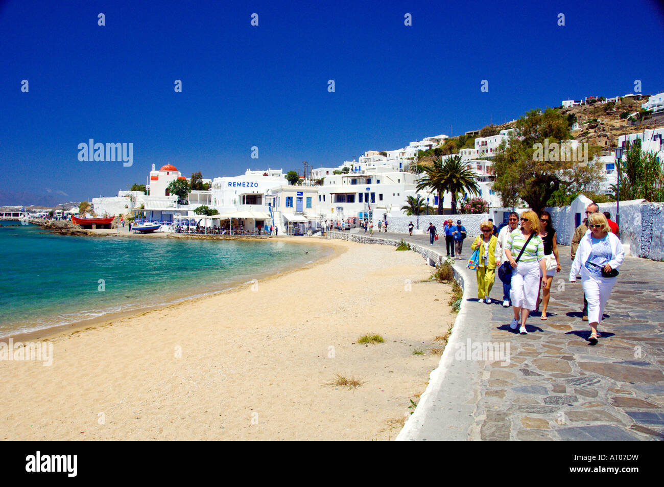 The seaside walkway at the port of Hora on the Greek Island of Mykonos ...