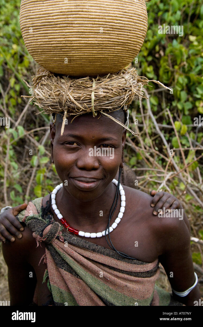 Young Girl Of The Mursi Tribe With Ear Plugs, Omo River Valley ...