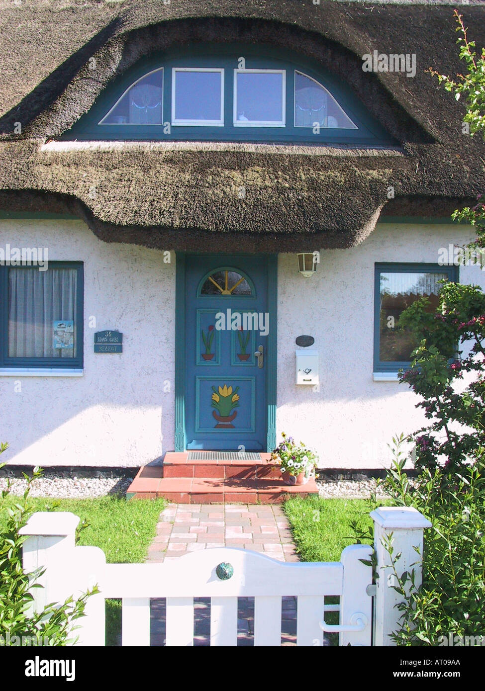 Colourful thatched house door on the German Baltic sea Stock Photo - Alamy