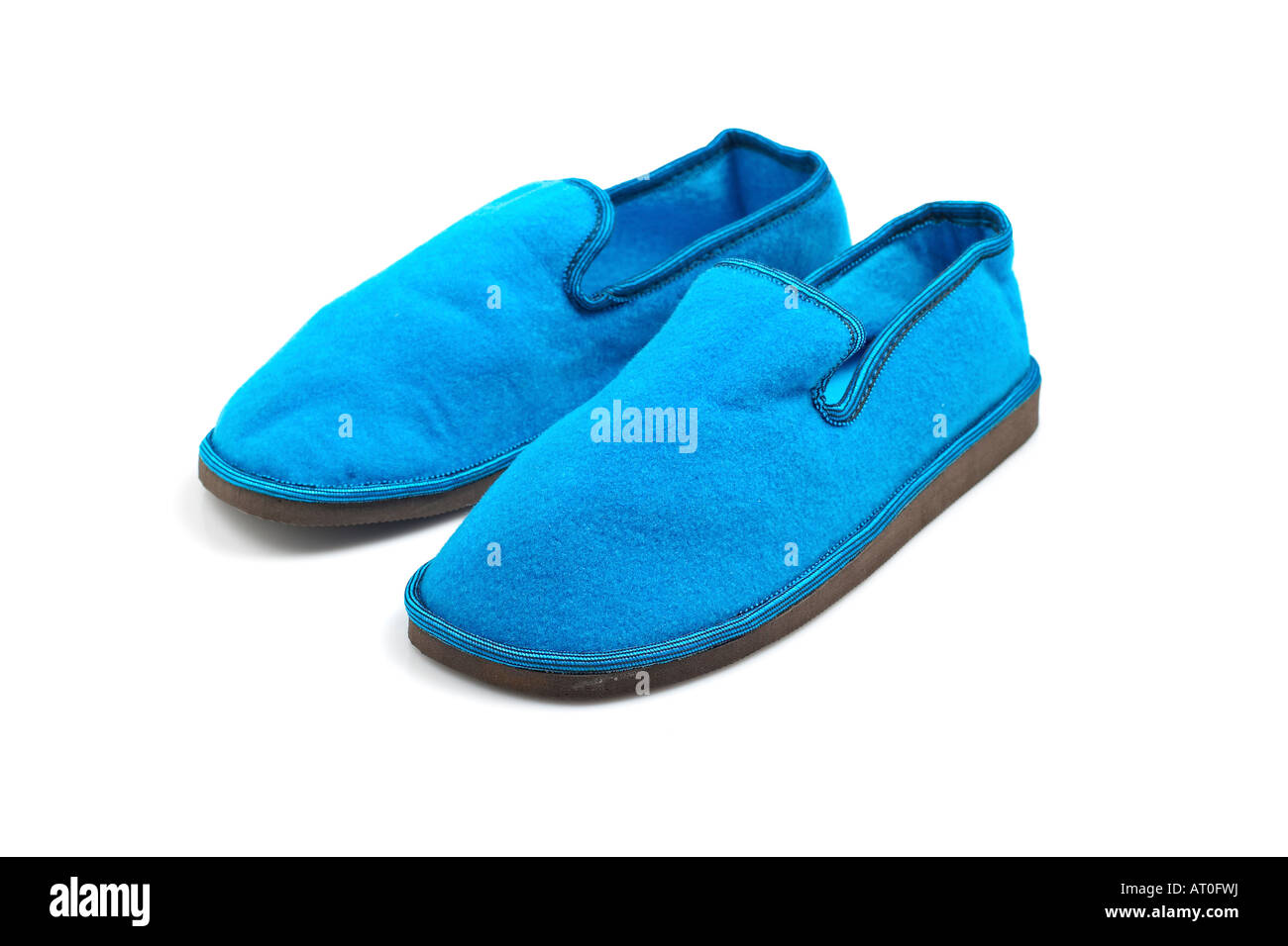 Lady blue slippers with soft on white background Stock Photo - Alamy