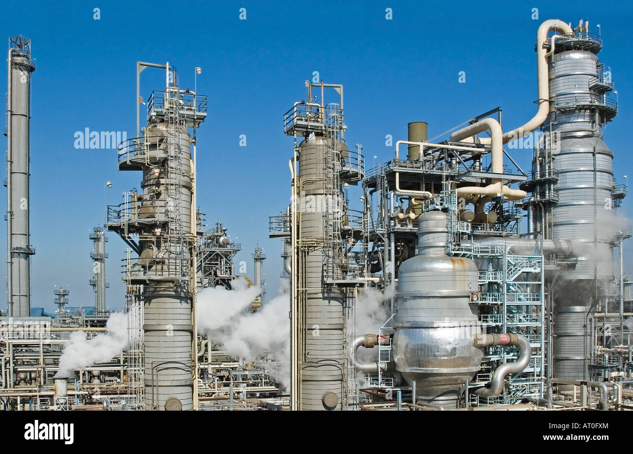 A complex oil refinery for making gasoline Stock Photo - Alamy