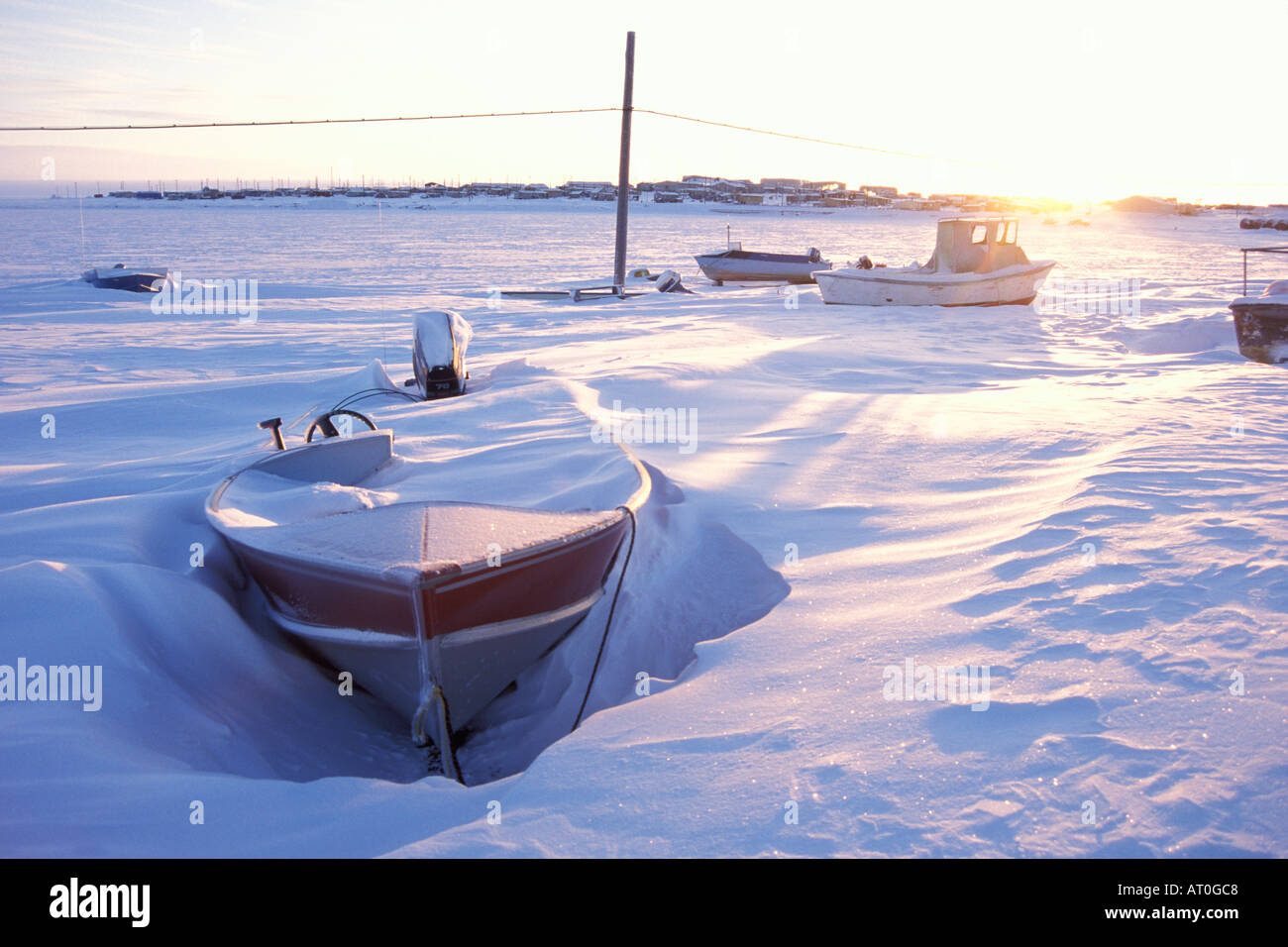 boats covered in snow at the village of Kaktovik 1002 coastal plain of ...