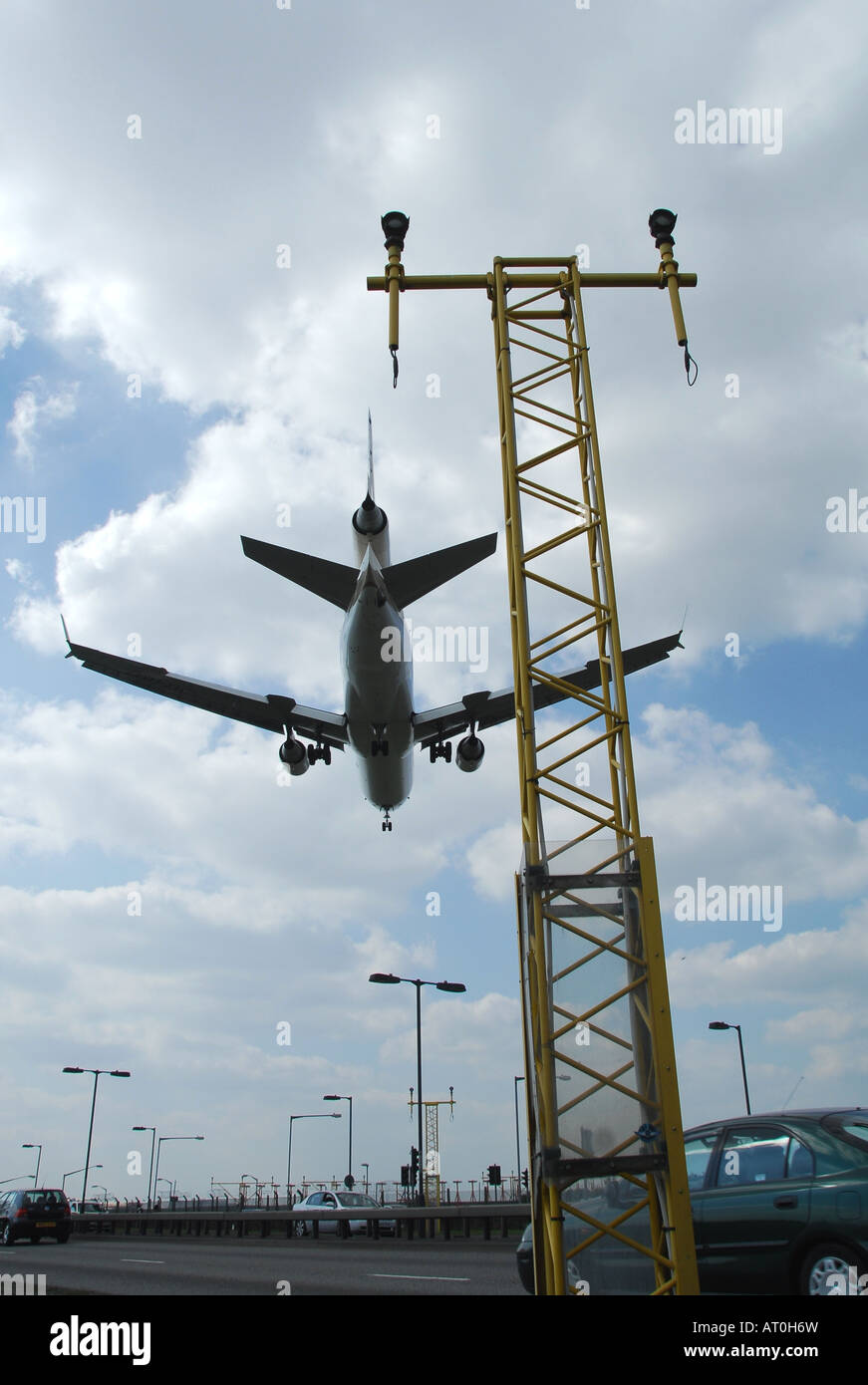 A MD-11 passes over the ILS just before landing at Heathrow airport ...