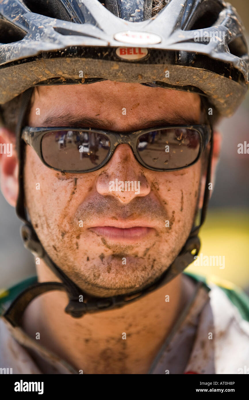 A competitors muddy face after competing in a mountain bike race in ...