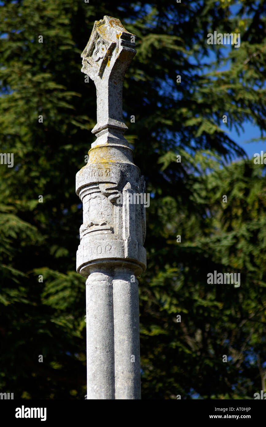 stone cross on a platform with steps and sculpted the crucifix that is ...