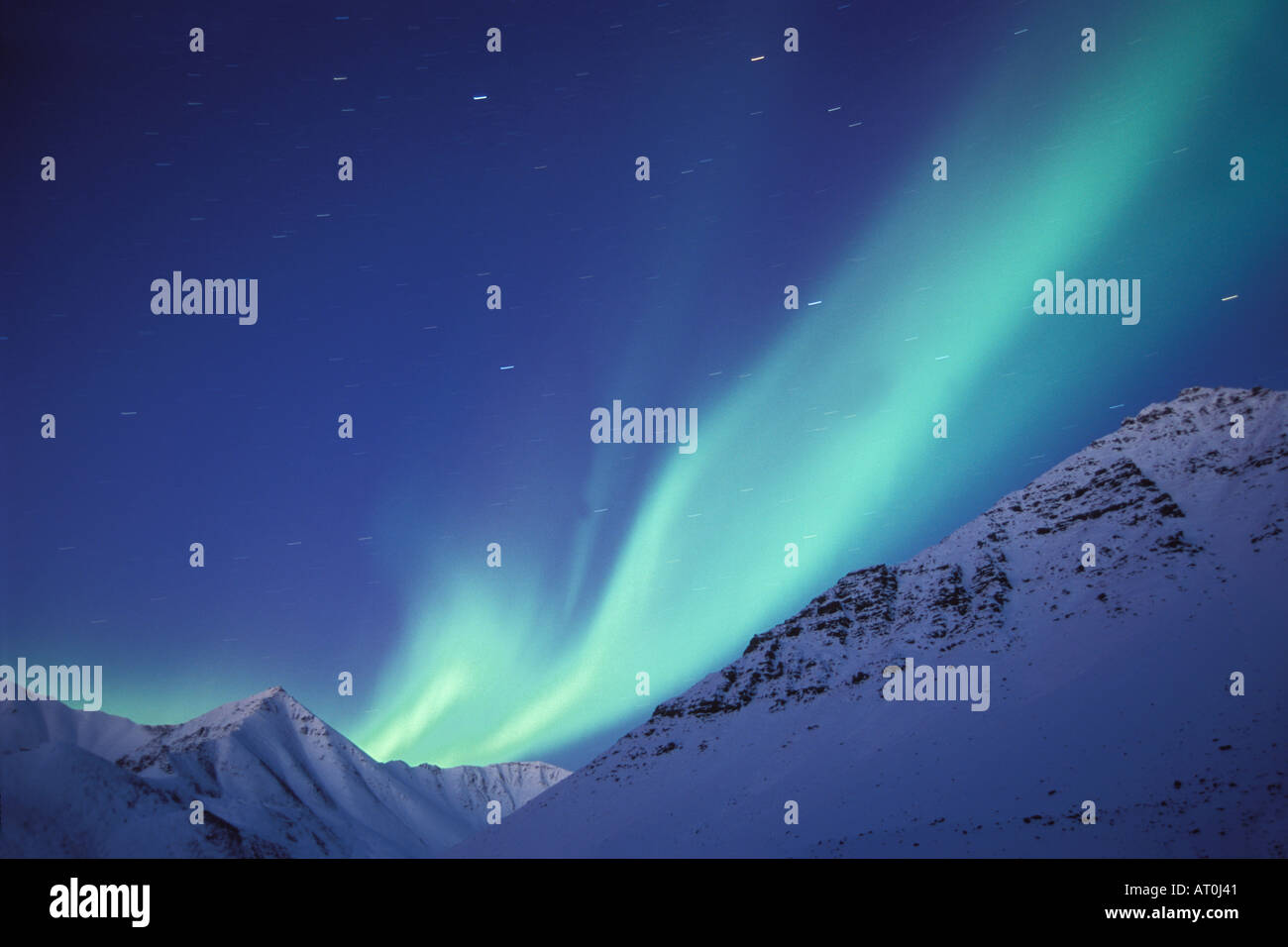 Northern Lights Aurora Borealis Over The Brooks Range Of Western Arctic