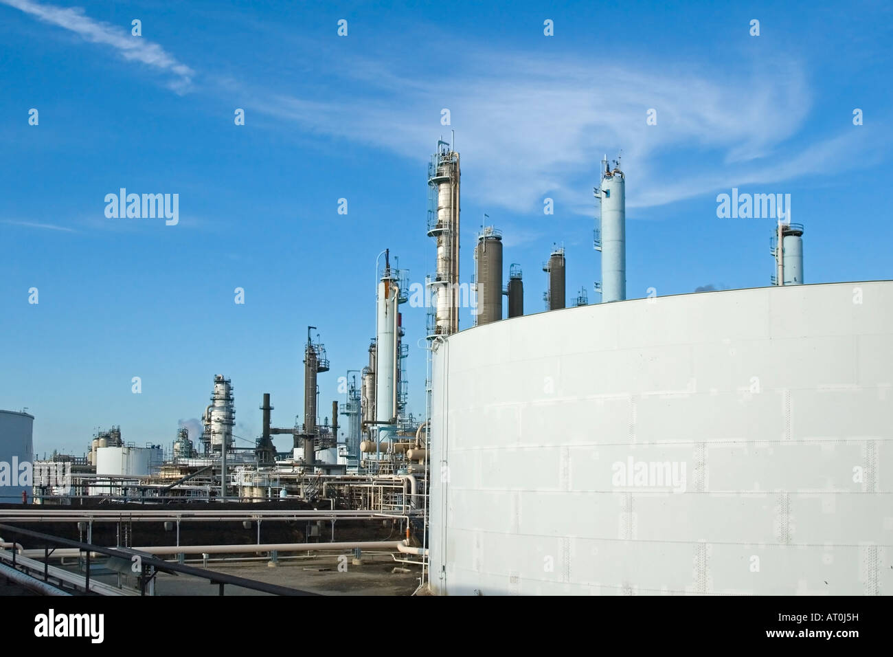 The storage tanks at an oil refinery complex Stock Photo - Alamy