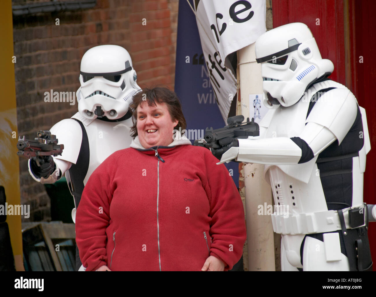 Smiling woman posing for photograph with Stormtroopers in Chesterfield ...