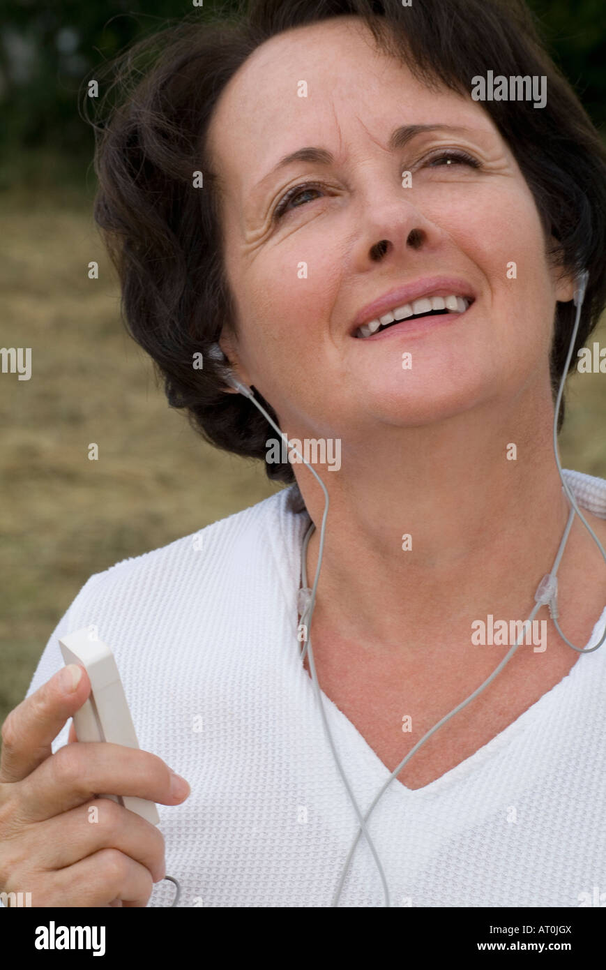 Woman listening music Stock Photo - Alamy