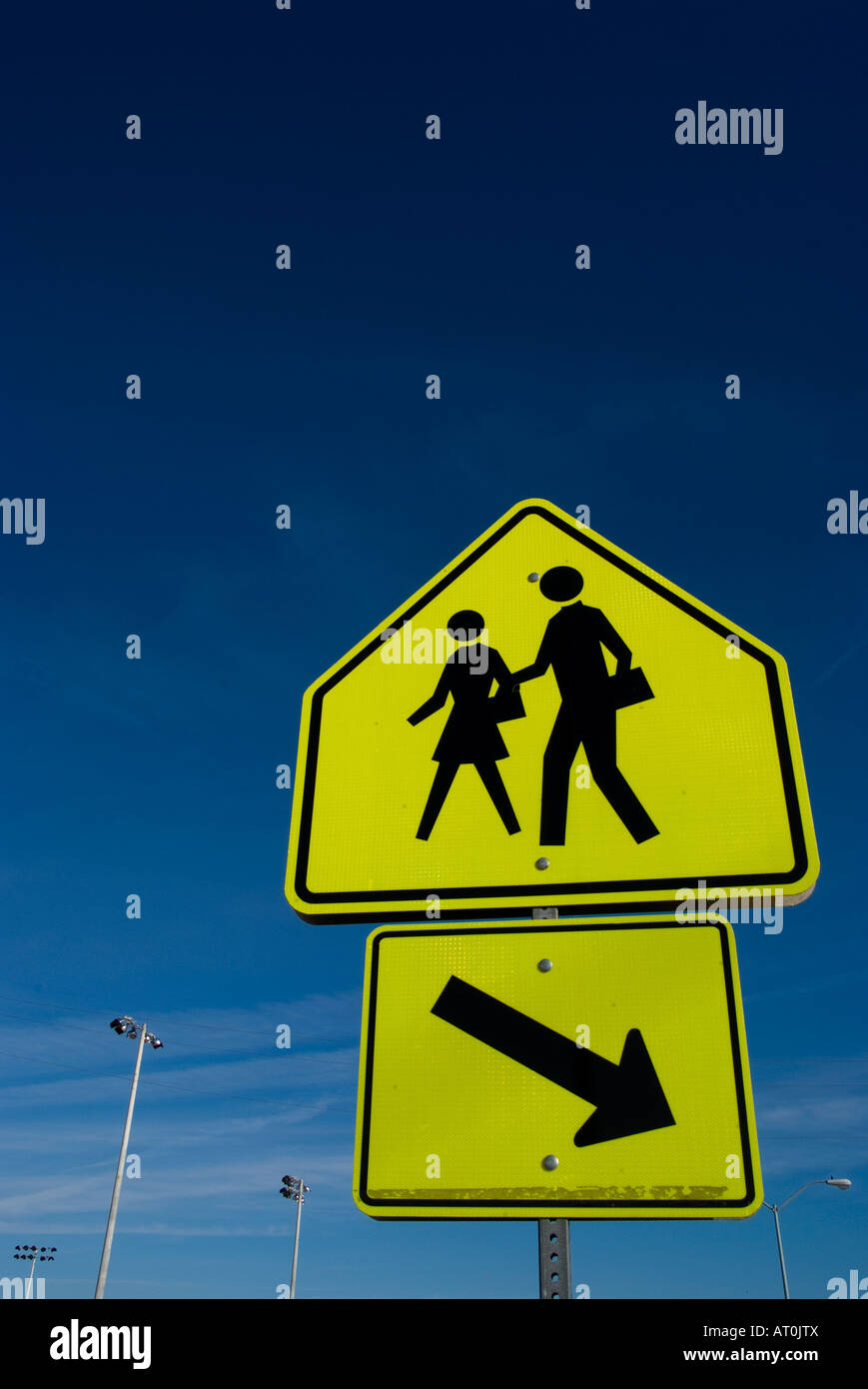 Crosswalk sign and arrow Stock Photo - Alamy