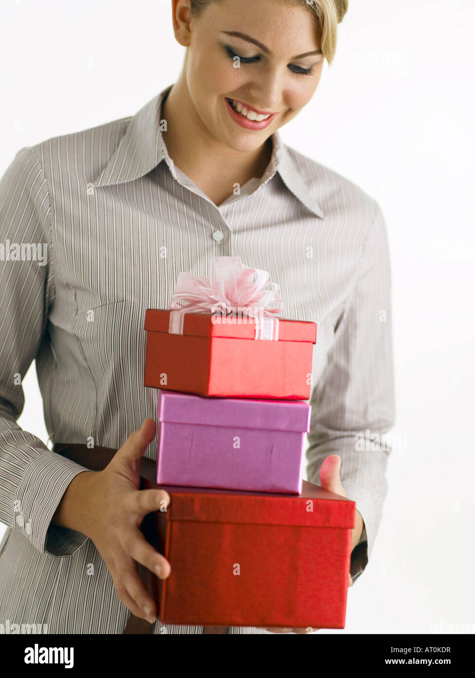 woman holding present boxes Stock Photo - Alamy