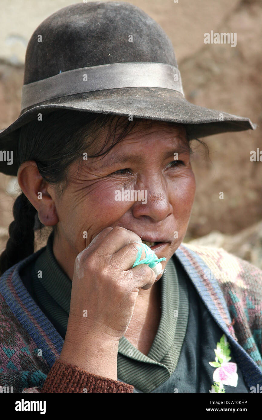 Traditional bolivian woman in hat chewing coca leaves Stock Photo - Alamy