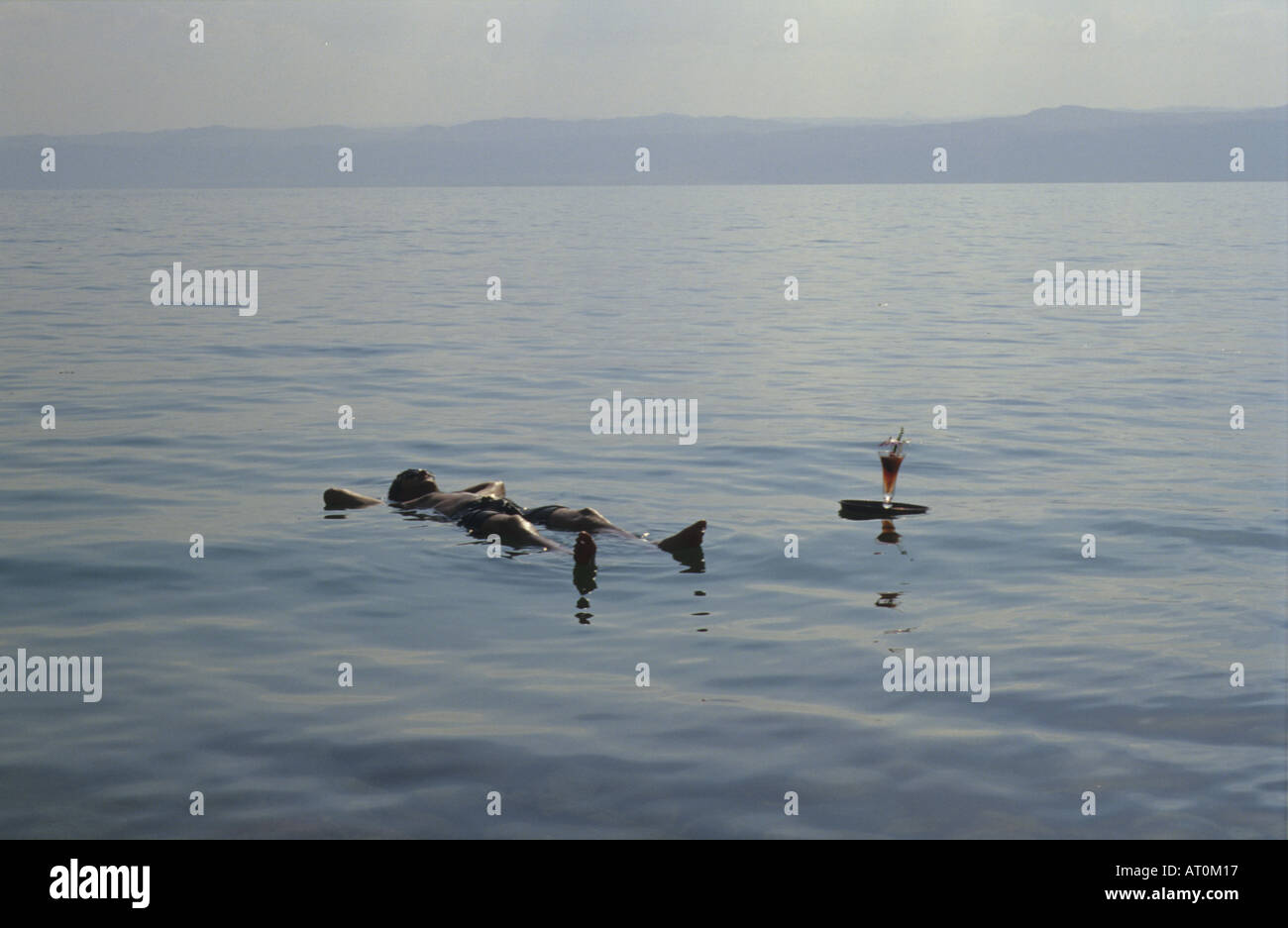 Man floating at Dead Sea Jordan Stock Photo - Alamy