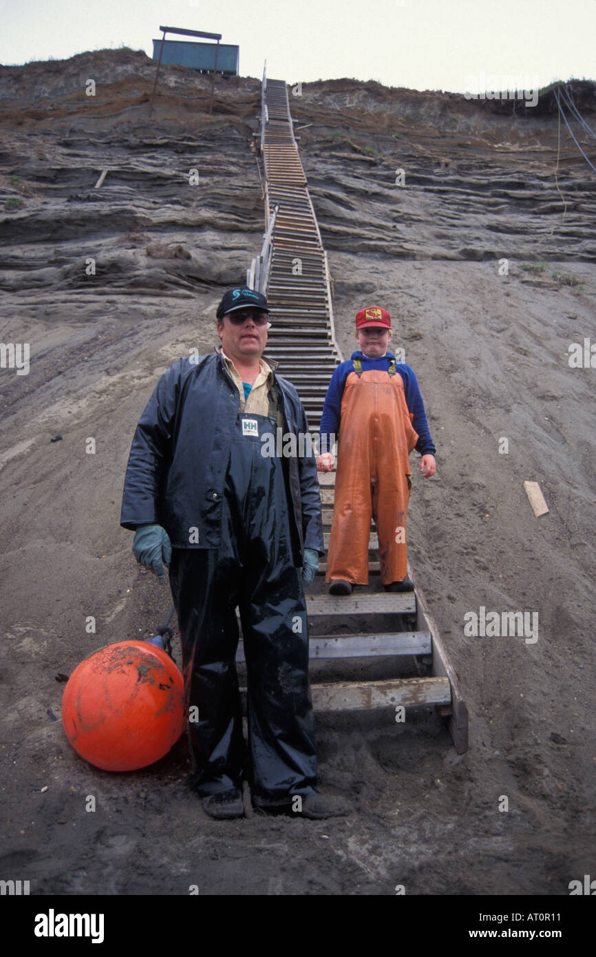 commercial set net fisherman and his son go to check nets for Kenai ...
