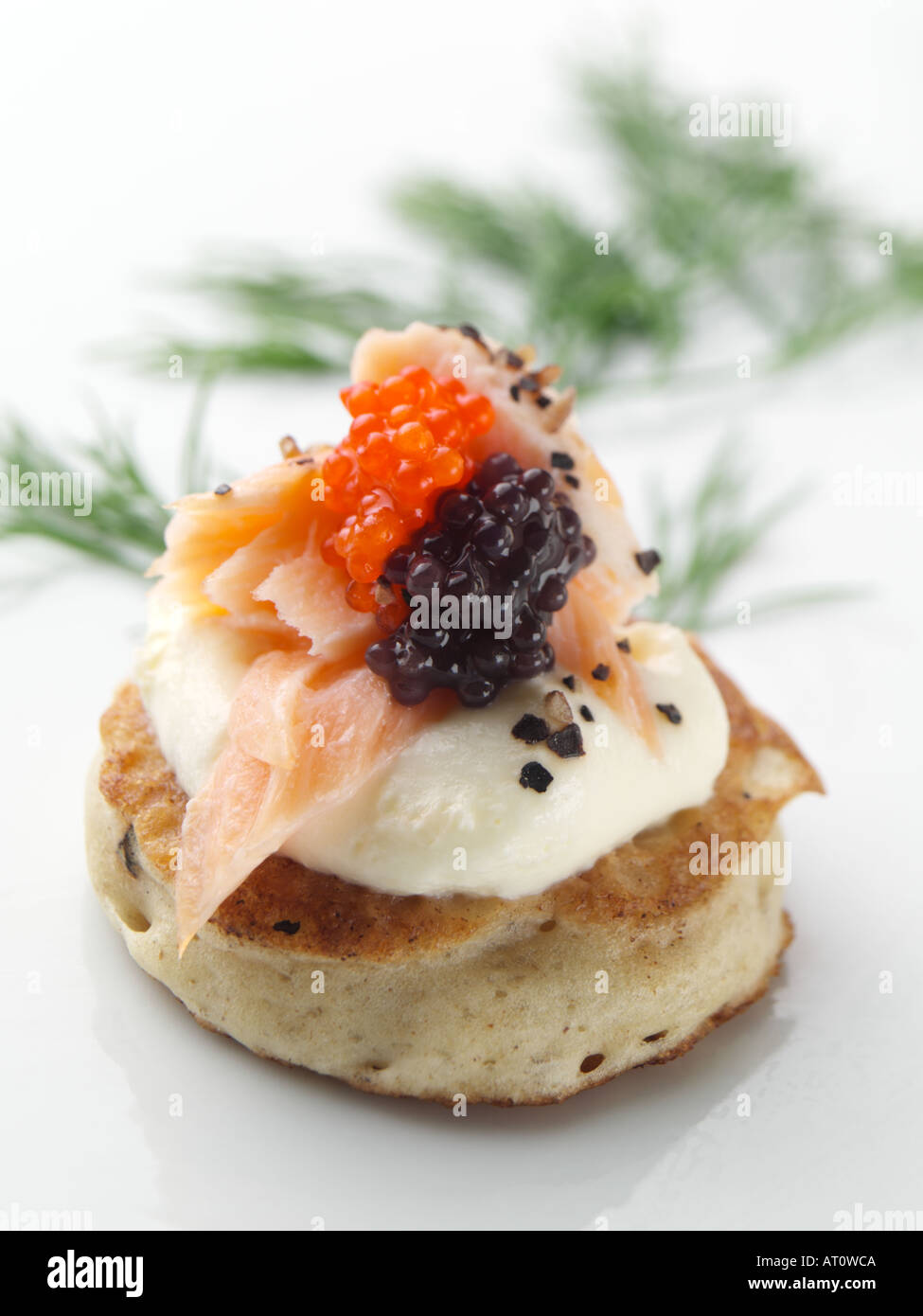 Individual caviar smoked salmon blini canape hi-res stock photography ...