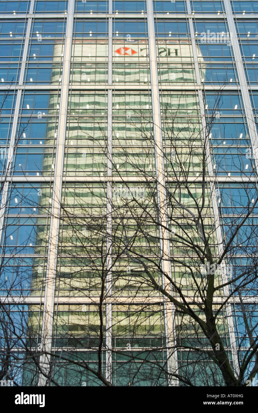 Vertical view of the HSBC Tower reflected in the windows of another ...