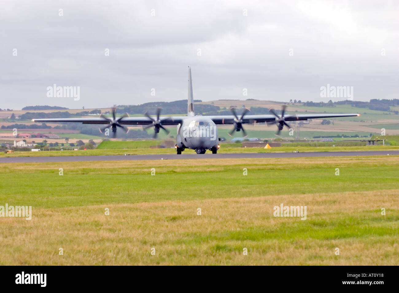 Face on view of RAF Hercules 30 Squadron propellers spinning up ready ...